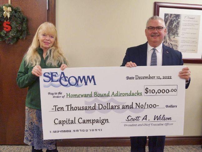 SeaComm donates $10K to Homeward Bound Adirondacks | Sun Community News ...